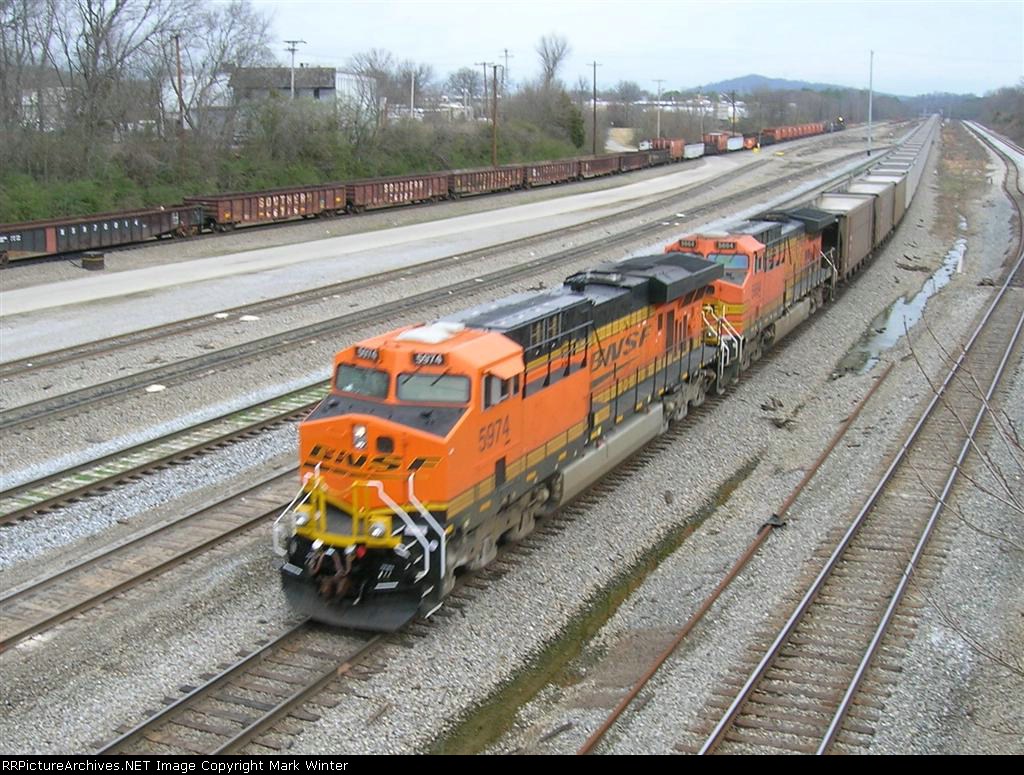 BNSF 5974 leading SB empty unit coal train,